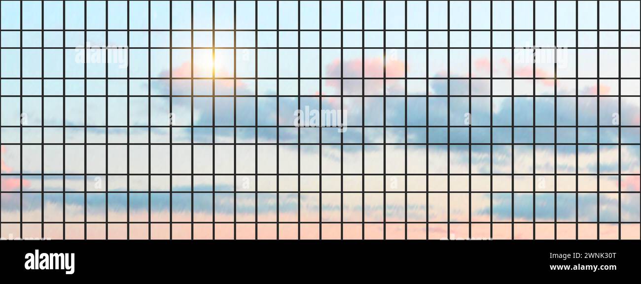 Sunset sky with clouds reflected in the facade of an office building ...