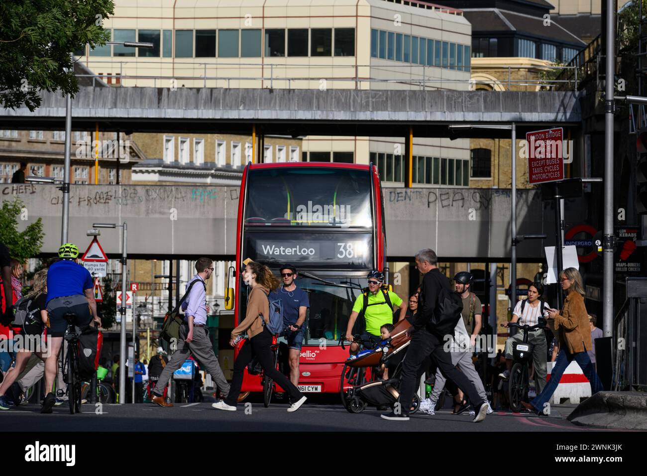 Pedestrians using a pelican crossing to cross Tooley Street during the ...