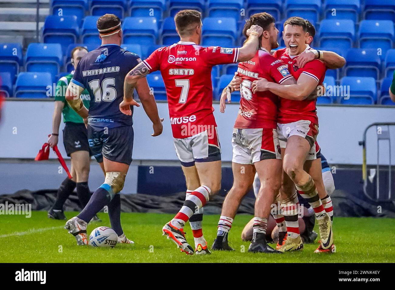 Deon Cross scored in the corner and celabrates with his team mates ...