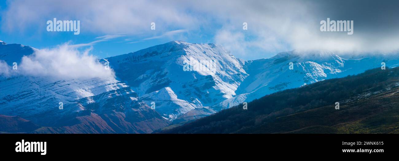 Summits of the Miera Valley in winter, aerial view of the Miera River ...