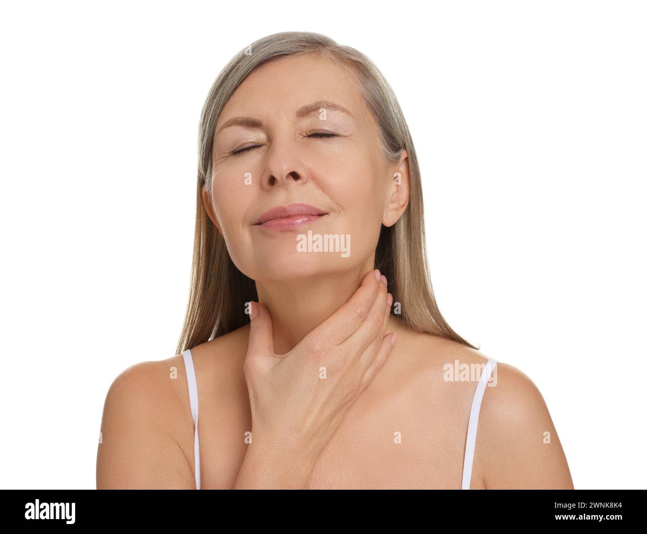 Beautiful woman touching her neck on white background Stock Photo - Alamy