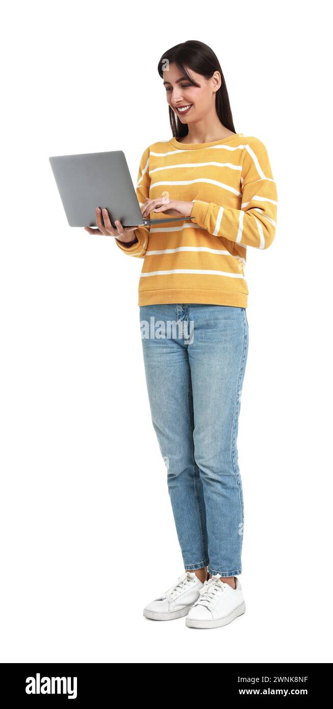 Happy woman using laptop on white background Stock Photo - Alamy