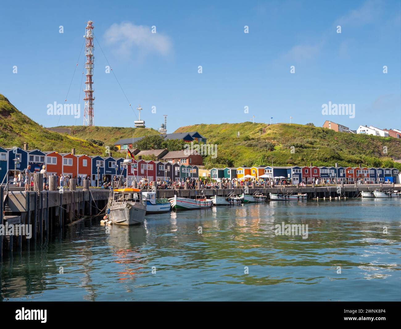 Promenade with wooden lobster shacks at harbour of Helgoland, island in ...