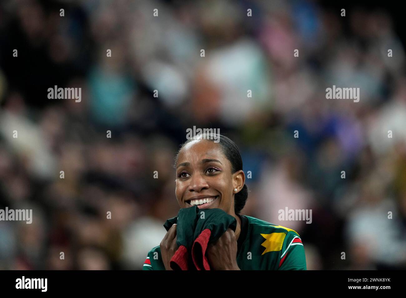 Thea Lafond, of Dominica, reacts after jumping 15.01 in the women's ...