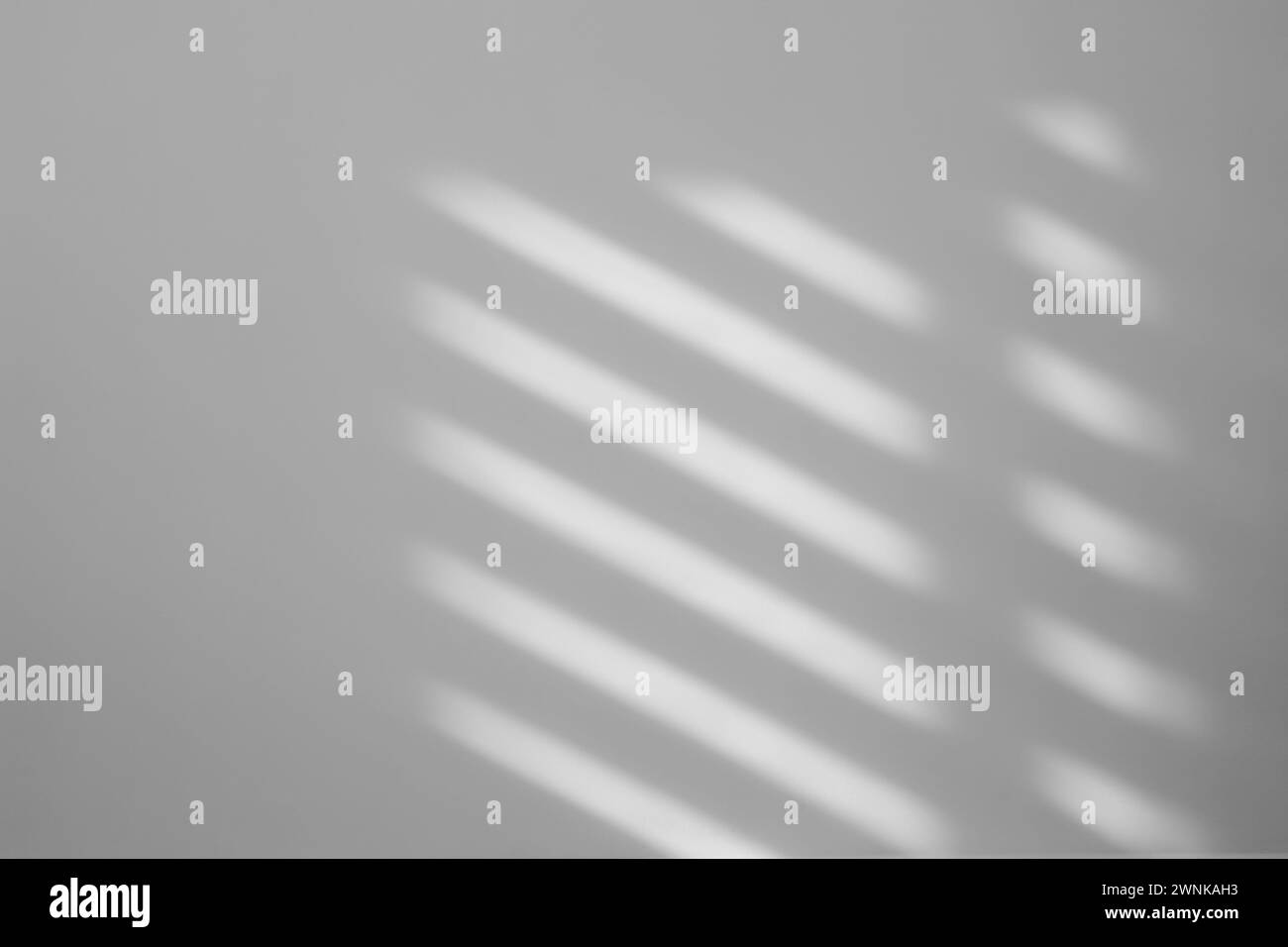 Light and shadows falling on white wall Stock Photo - Alamy