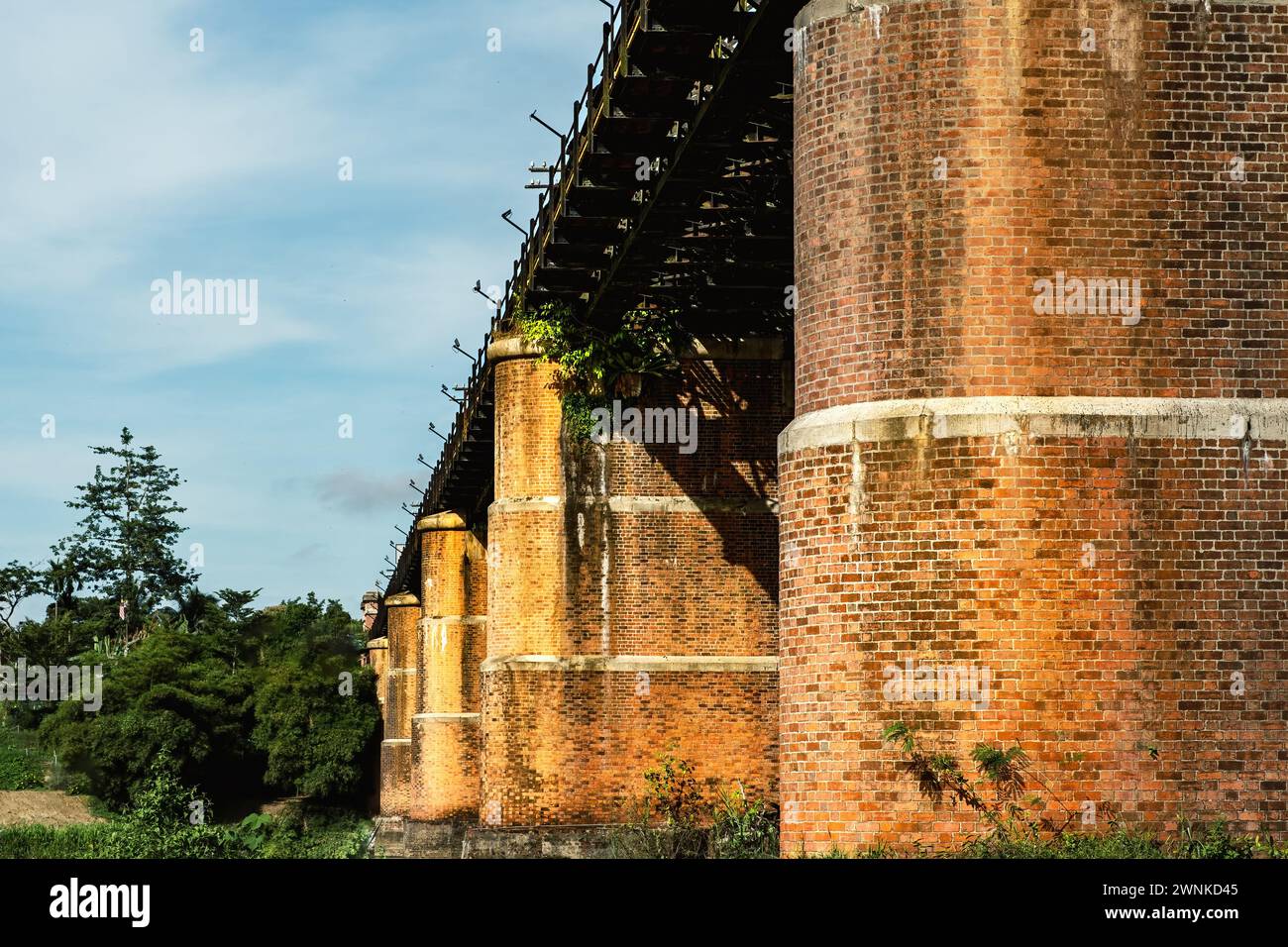 A large brick and stone masonry arch bridge over the Kuala Kangsar ...
