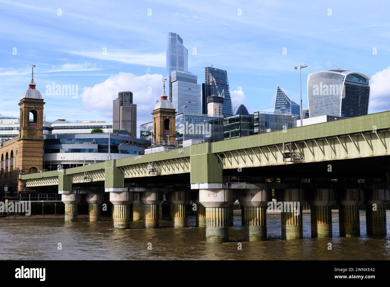 Cannon Street railway bridge and station with the skyscrapers of the ...