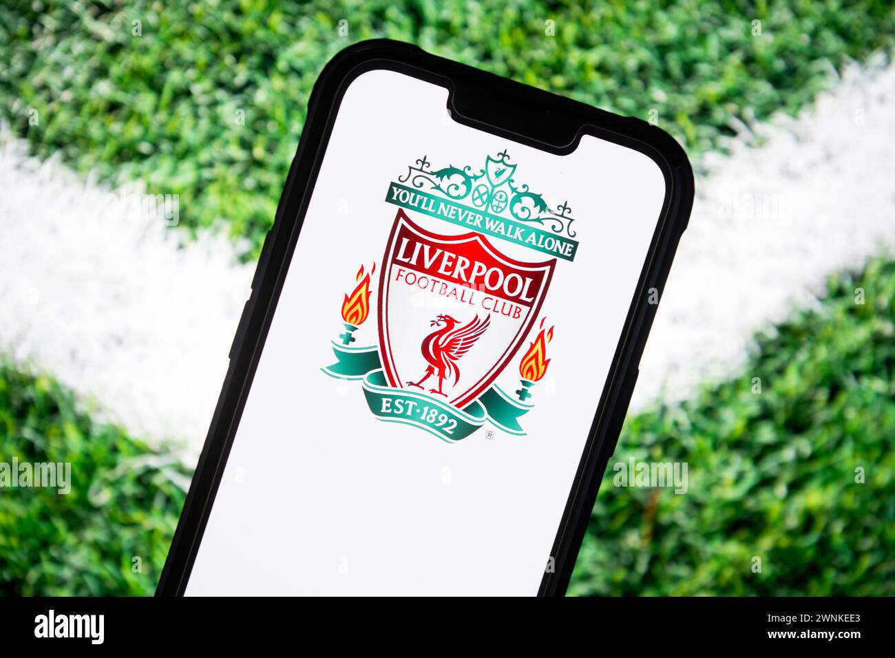 Poland. 23rd Feb, 2024. In this photo illustration, a Liverpool FC ...