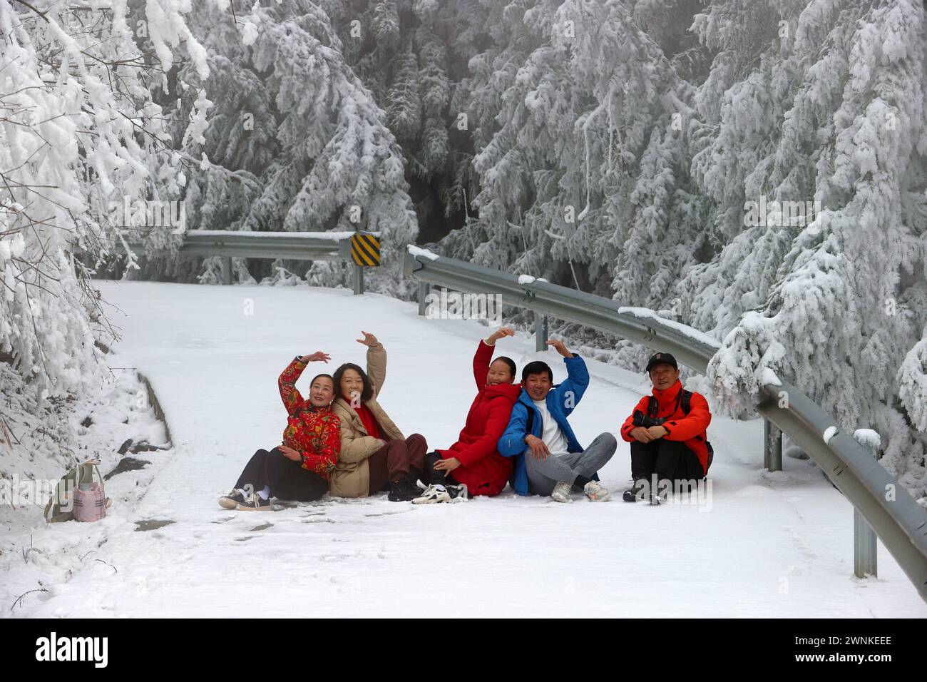 CHONGQING, CHINA - MARCH 2, 2024 - Tourists enjoy the snow scenery at ...