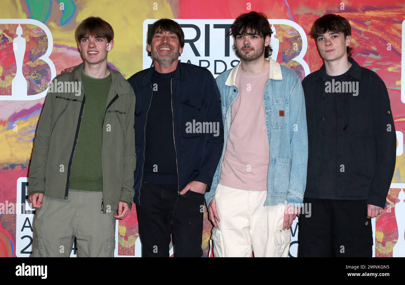 London, UK. 02nd Mar, 2024. Alex James (2R) and sons Geronimo, Artemis ...