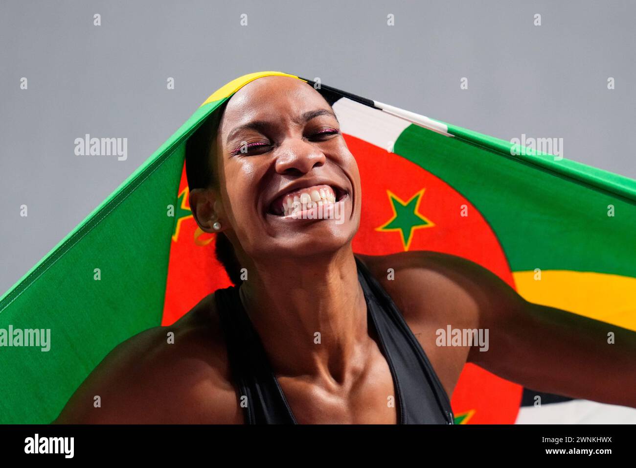 Thea Lafond, of Dominica, reacts after winning the gold medal in the ...