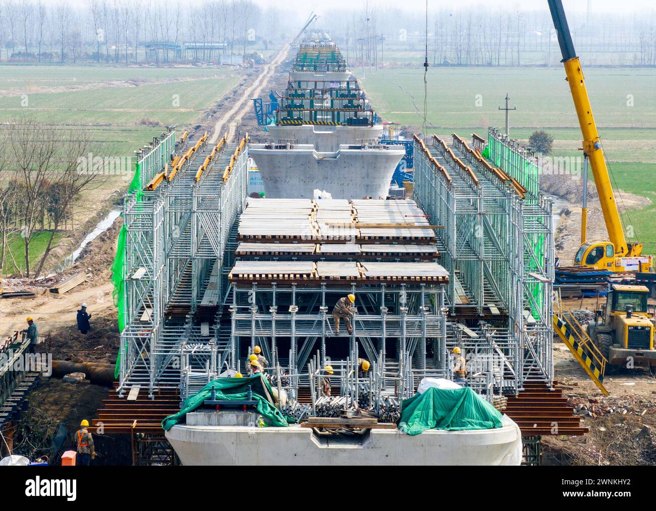 HUAI'AN, CHINA - MARCH 3, 2024 - Workers Carry out railway pier and ...