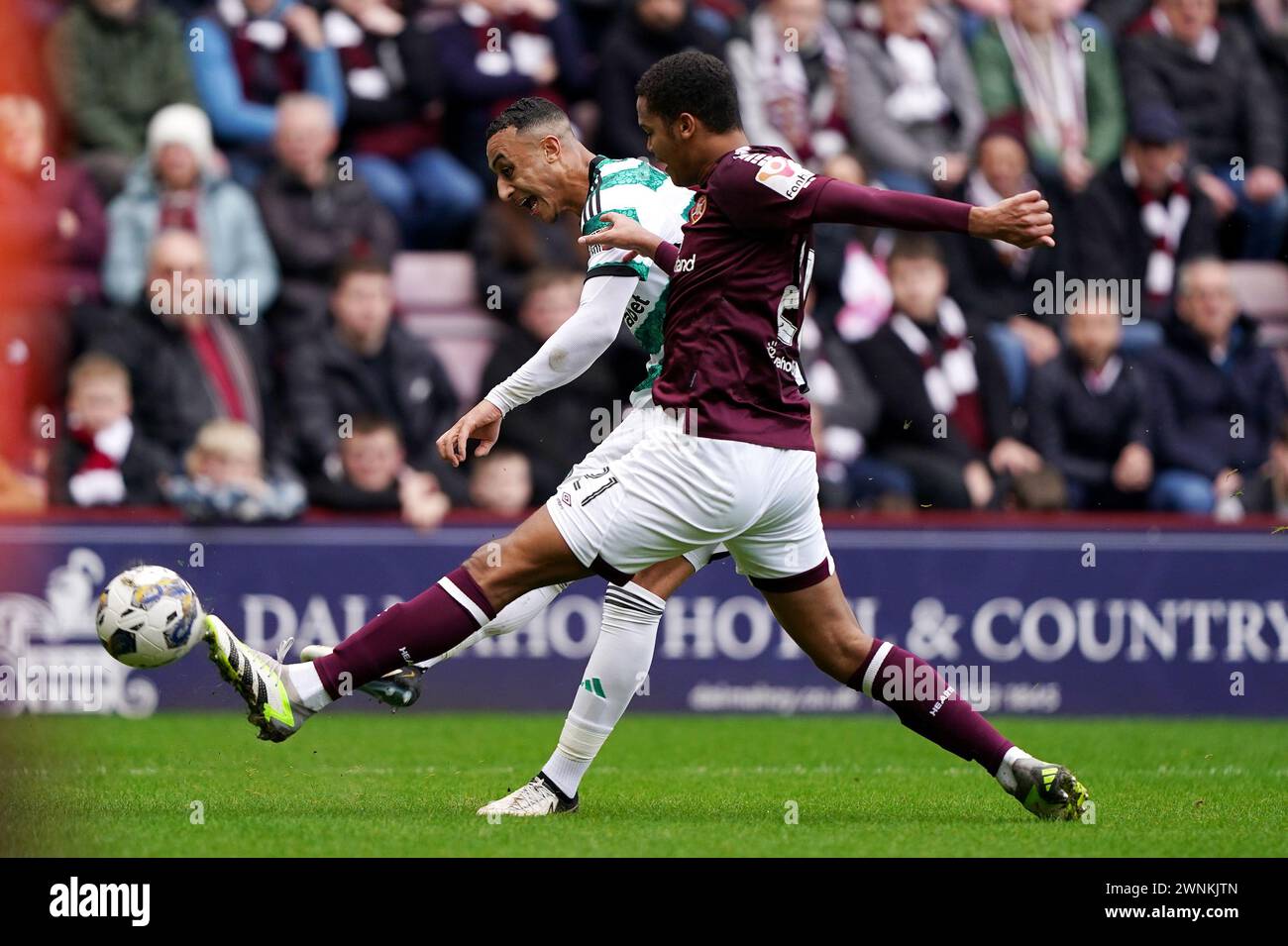 Heart of Midlothian's Toby Sibbick (right) attempts to block Celtic’s ...