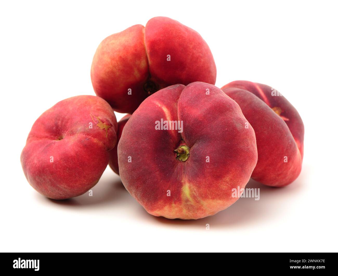 chinese flat peaches on white background Stock Photo - Alamy