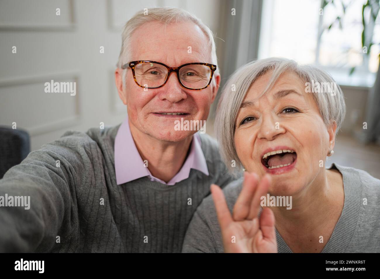 Old couple talking to their children hi-res stock photography and ...