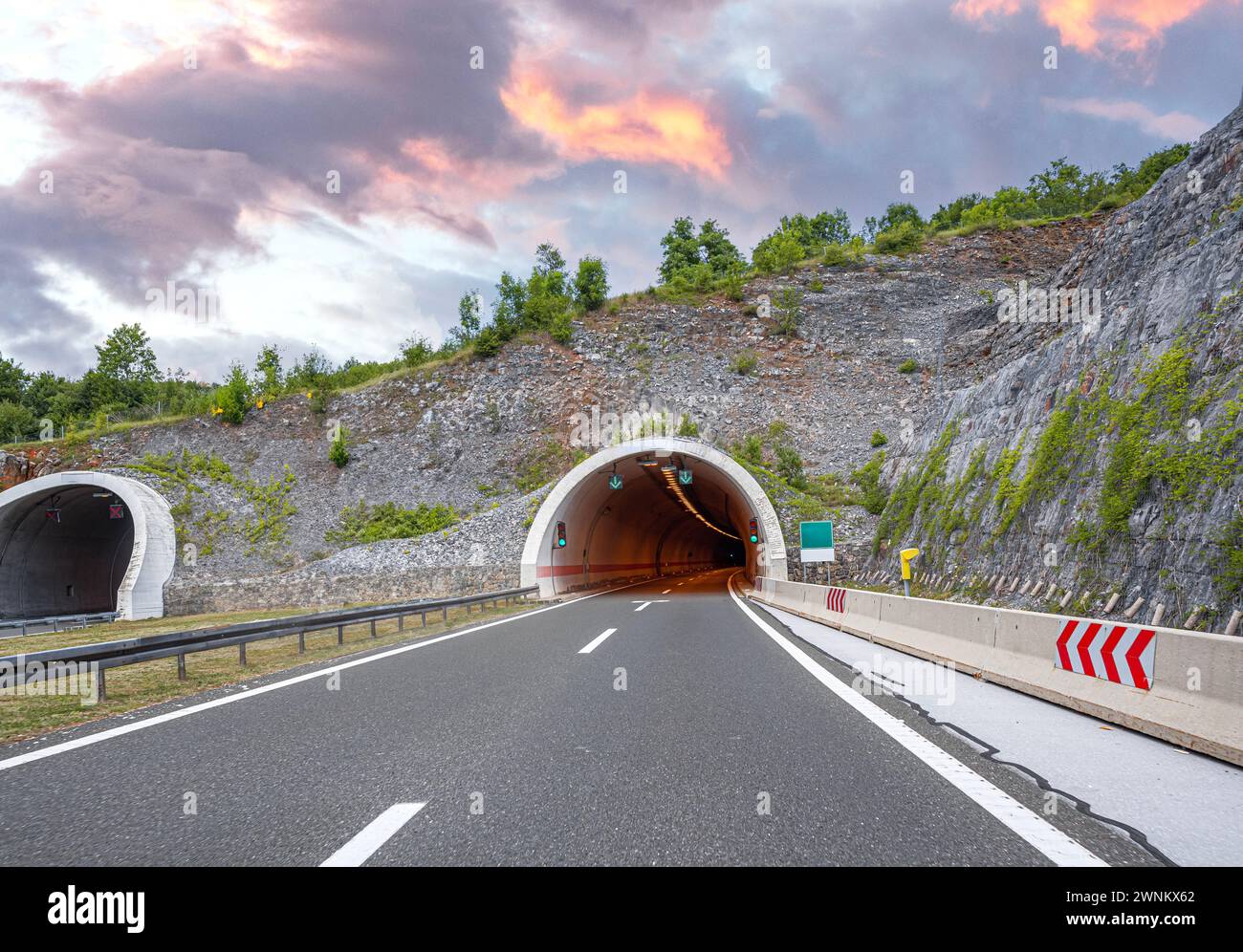 Tunnel on a highway Stock Photo - Alamy