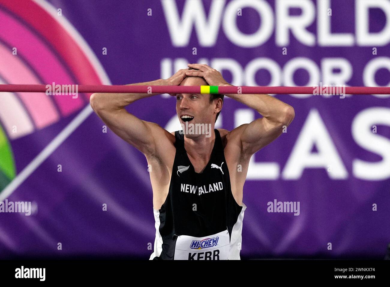 Hamish Kerr, of New Zealand, reacts after clearing the bar at 2.36 and ...