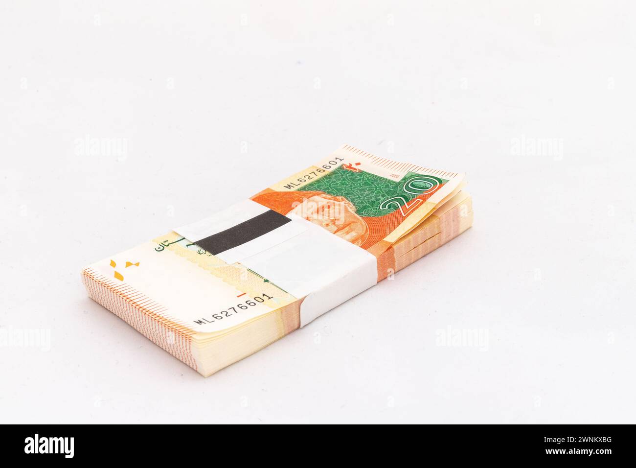 Twenty rupees banknote bundle of Pakistani currency on white isolated ...