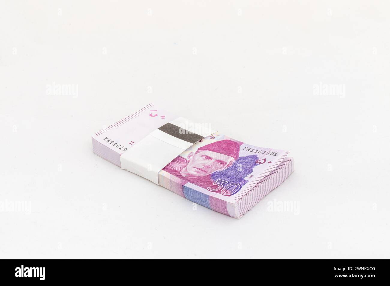 Pakistan fifty rupees denomination note bundle on white isolated ...