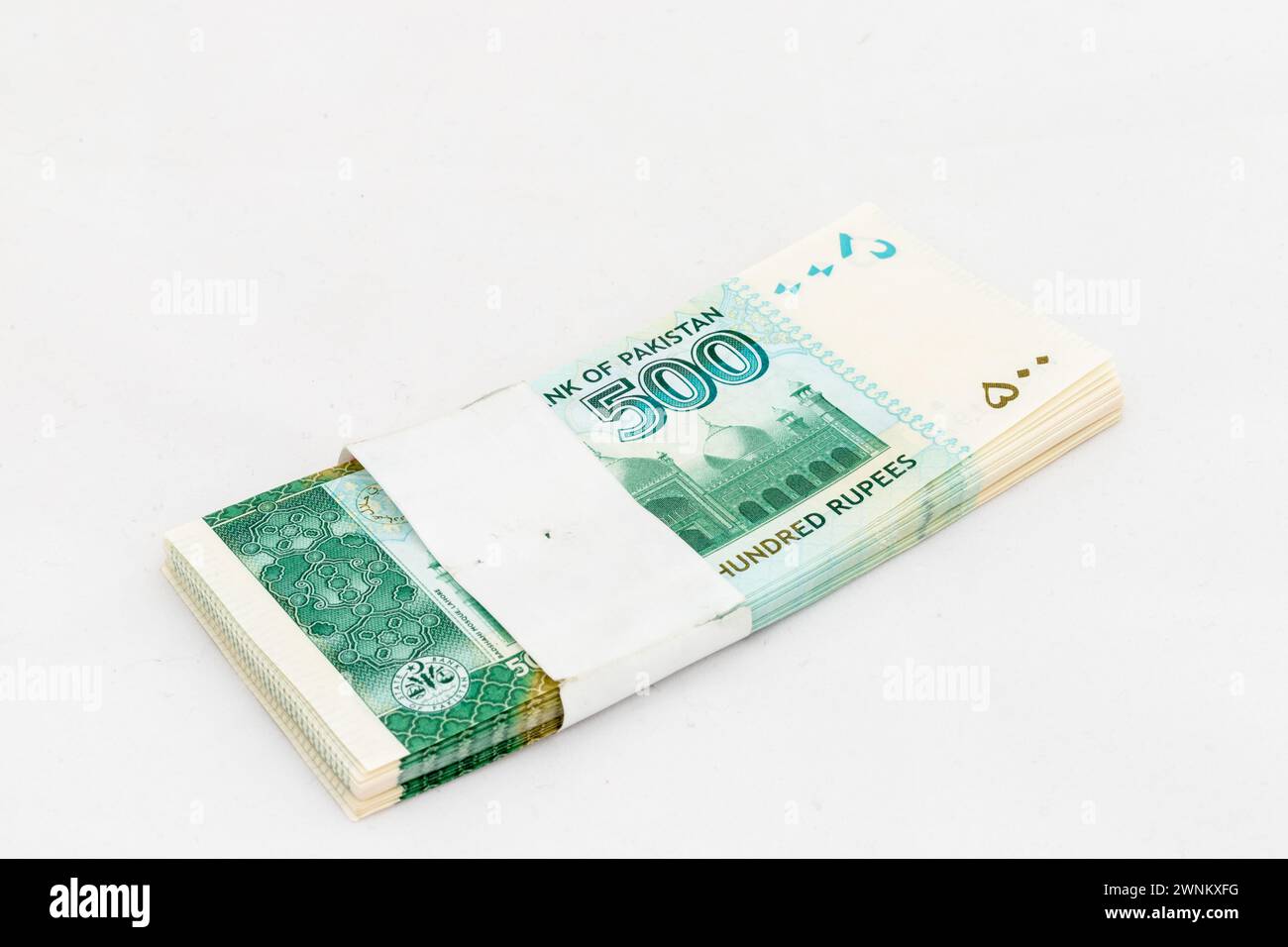 Pakistan five hundred rupees denomination note bundle on white isolated ...