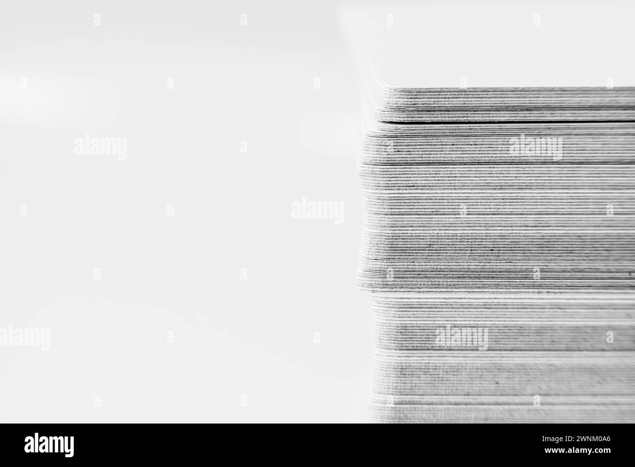 Close sidelong view of stacked cards in monochrome Stock Photo - Alamy
