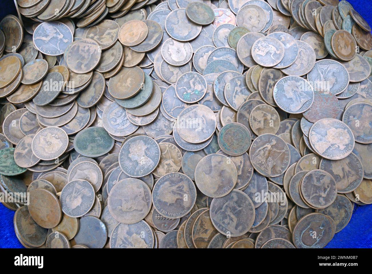 Pile of vintage coins placed on a tray for sale. Flea market Stock ...