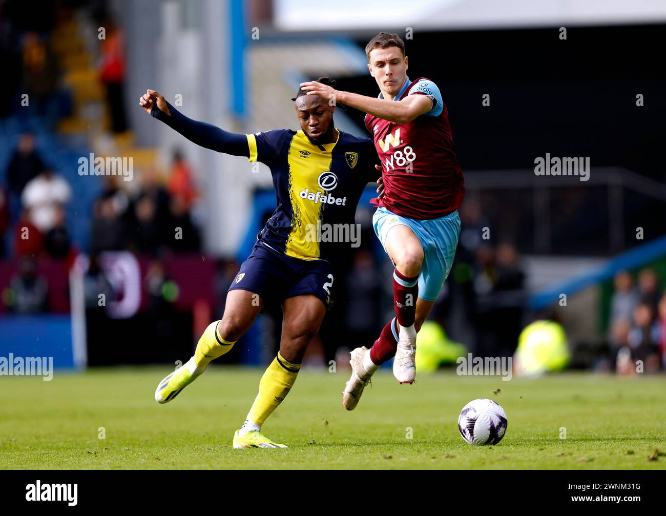 Bournemouth's Antoine Semenyo (left) and Burnley's Maxime Esteve battle ...