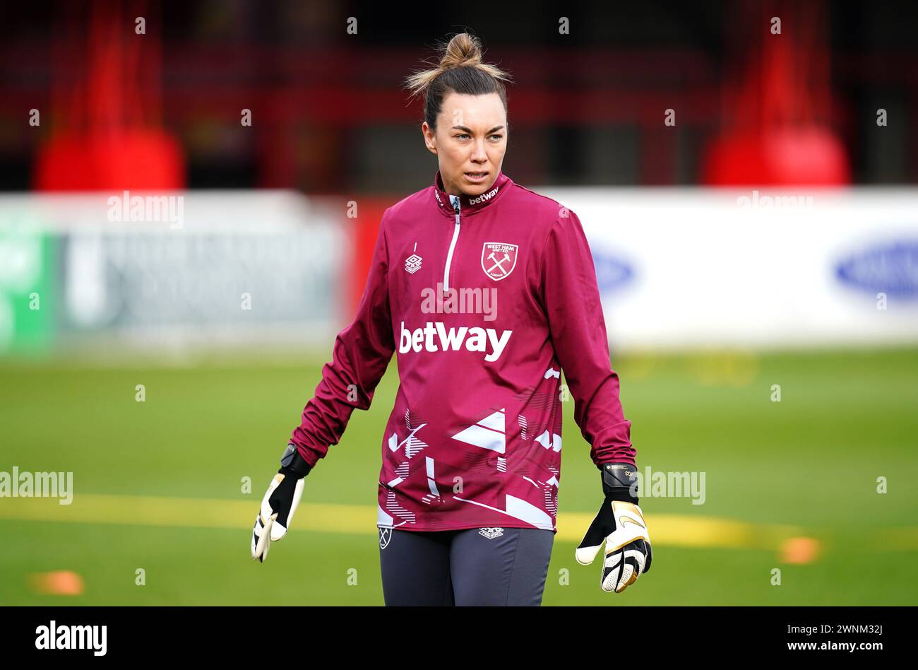 West Ham United goalkeeper Mackenzie Arnold warming up ahead of the ...