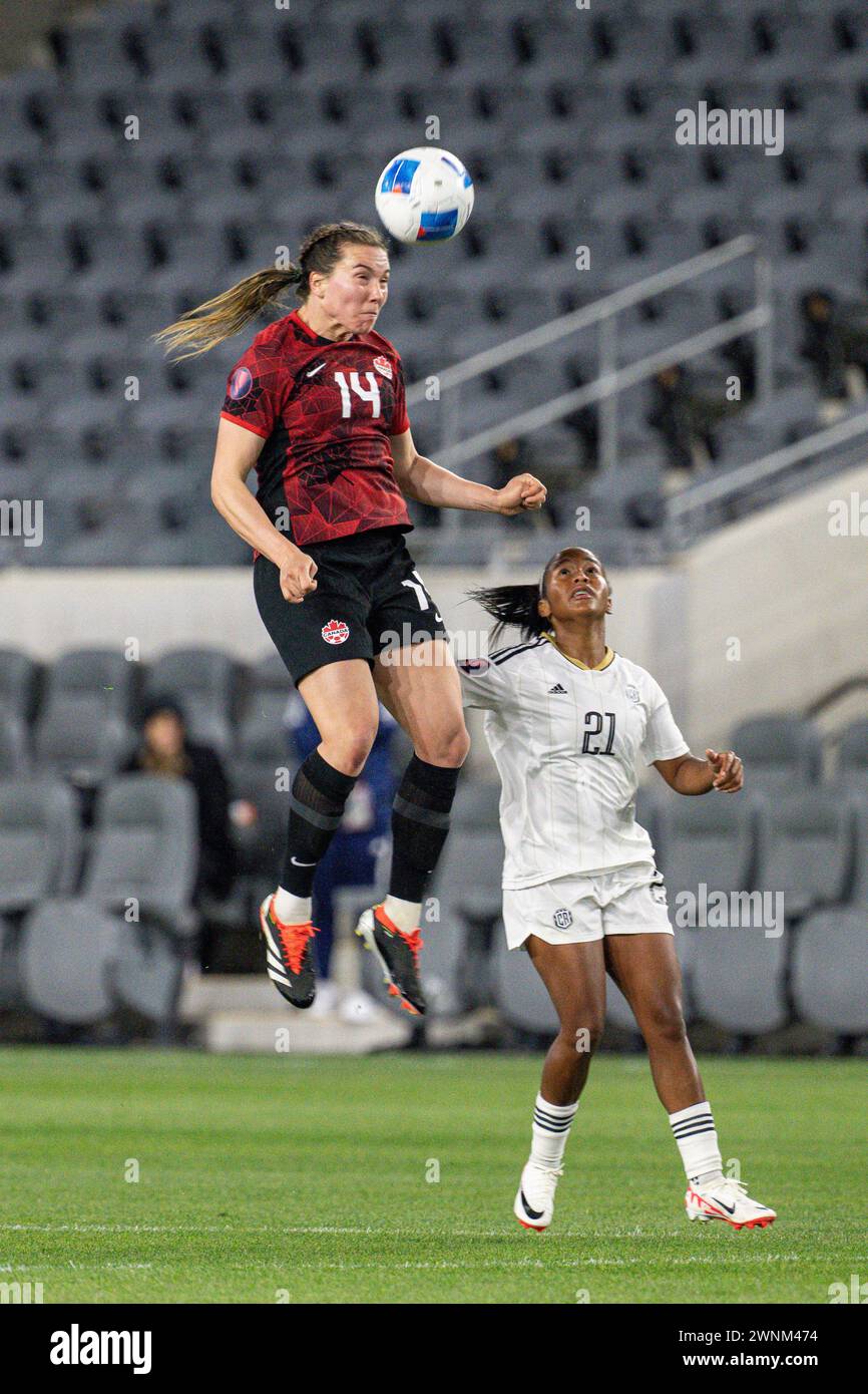 Canada defender Vanessa Gilles (14) wins a header against Costa Rica ...