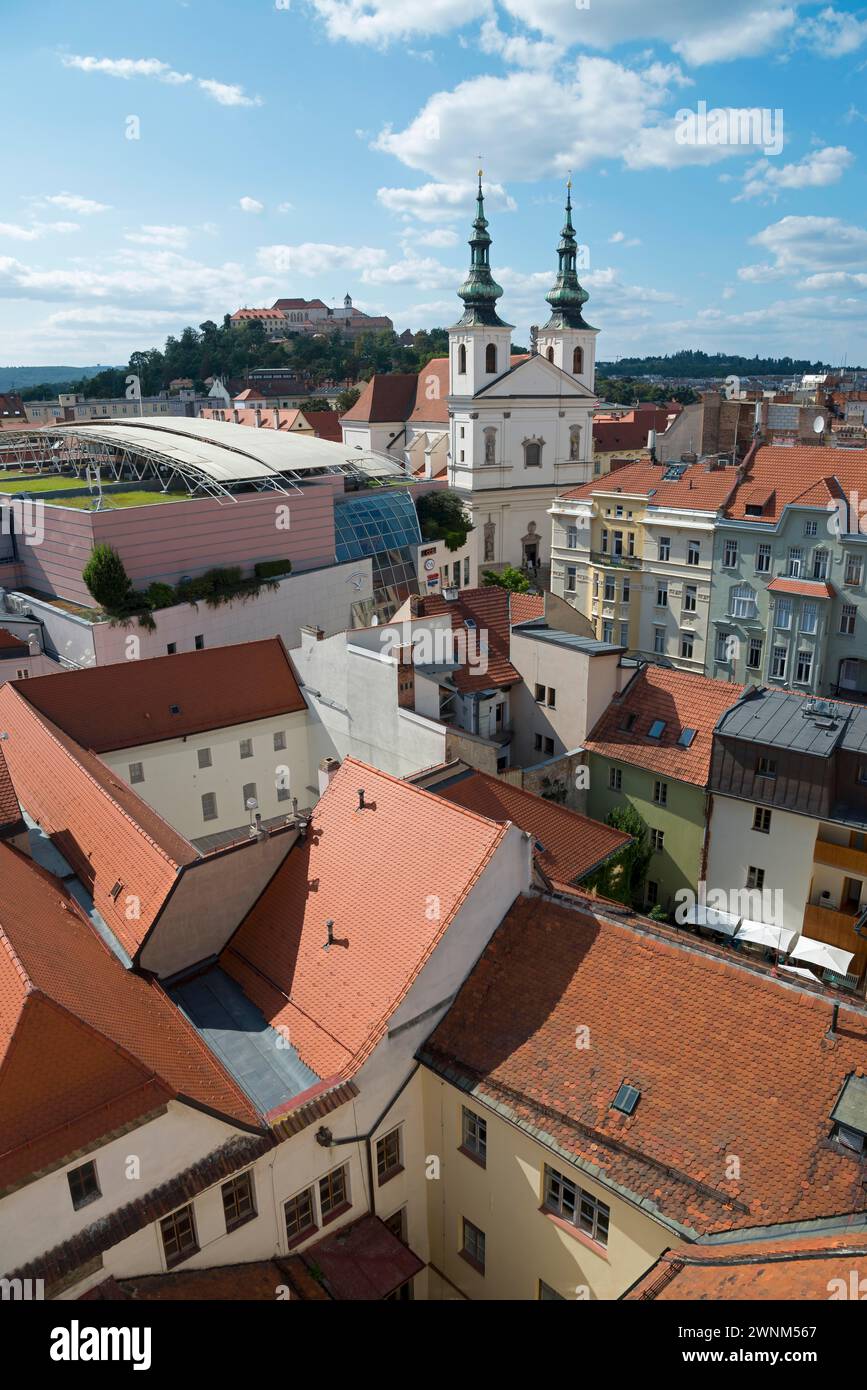 Urban scene with a mixture of traditional church towers and modern ...