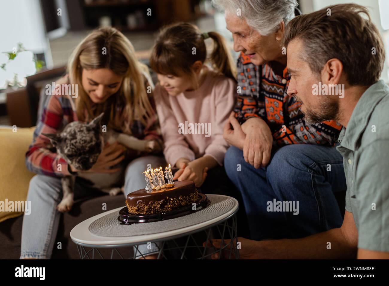 Heartwarming scene unfolds as a multi-generational family gathers on a ...