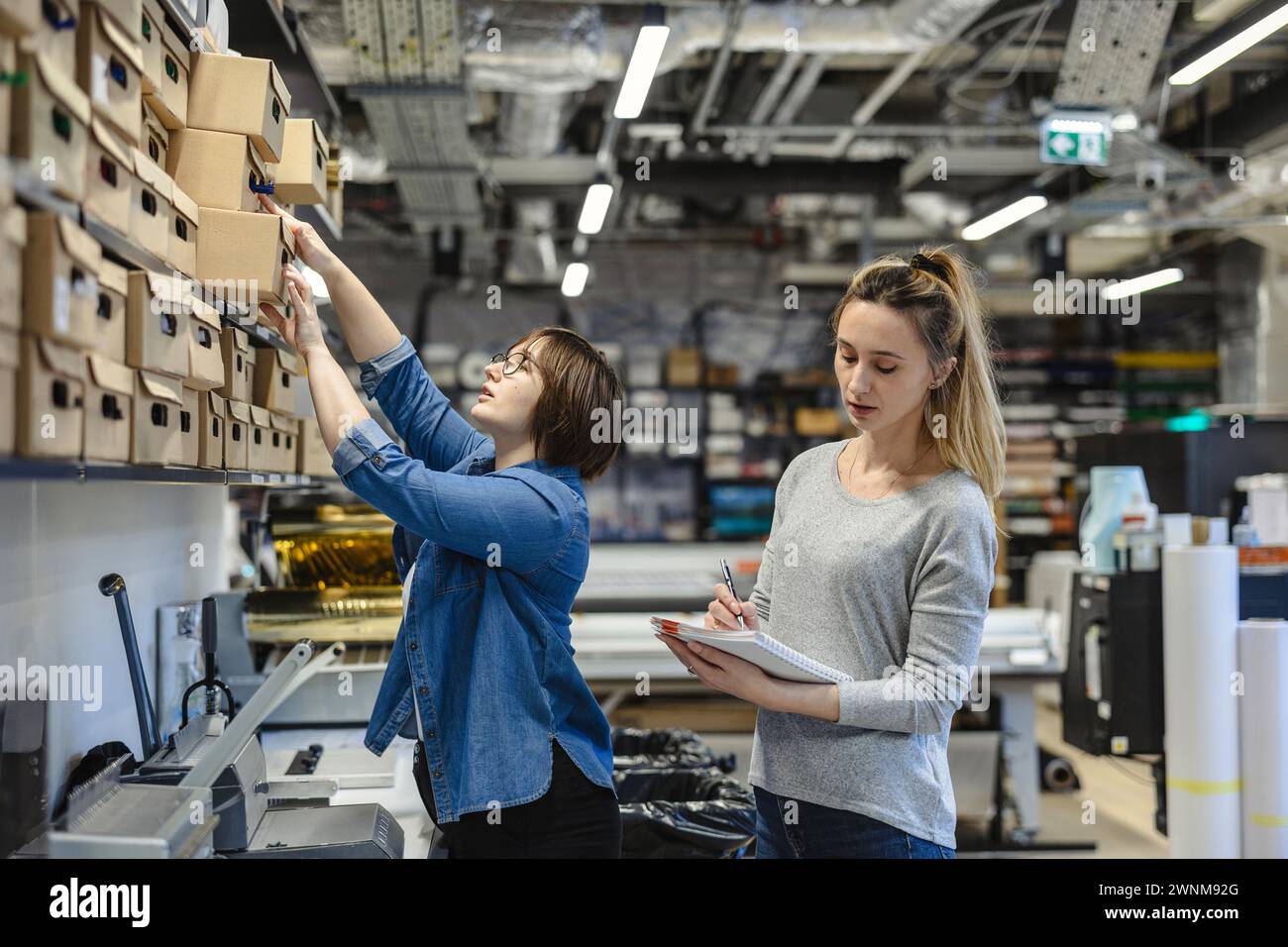 Female coworkers in office working hi-res stock photography and images ...