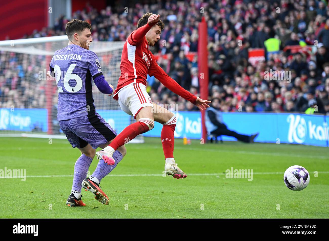 Neco Williams of Nottingham Forest battles with Andrew Robertson of ...