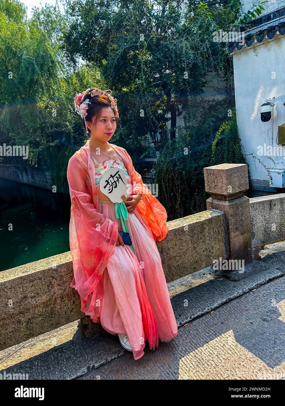 Suzhou, China, Portrait Woman Sitting on Bridge Chinese Tourists, in ...