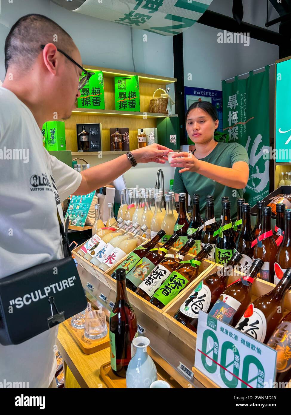 Suzhou, China, Chinese Tourists, Man Trying Local Alcohol in Shop ...