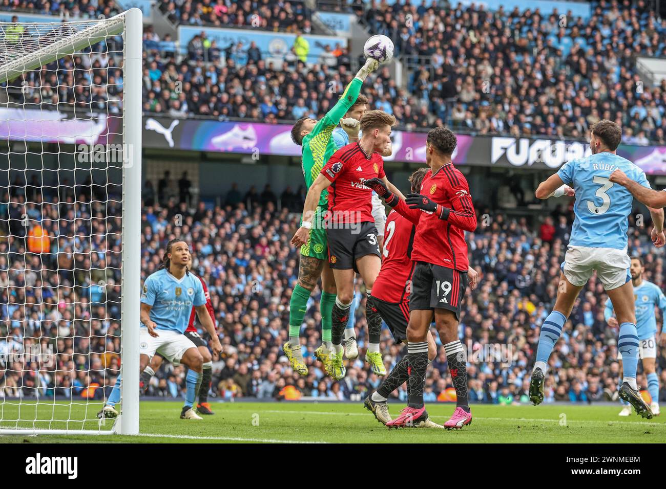 Manchester, UK. 03rd Mar, 2024. Ederson of Manchester City punches ...