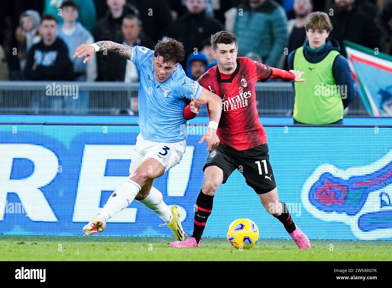 Rome, Italy. 01st Mar, 2024. Luca Pellegrini of SS Lazio and Christian Pulisic of AC Milan ...