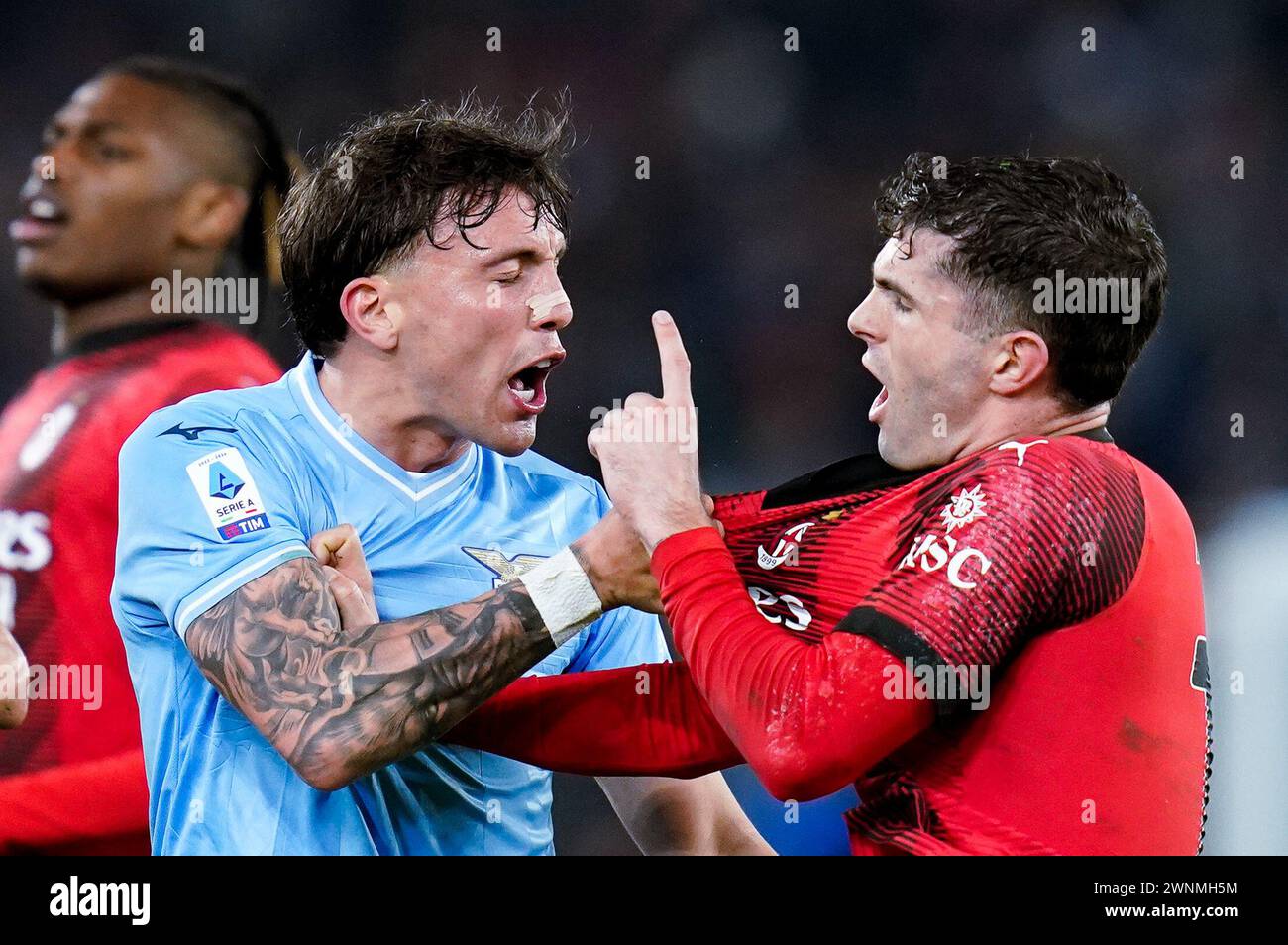 Rome, Italy. 01st Mar, 2024. Luca Pellegrini of SS Lazio argues with Christian Pulisic of AC ...