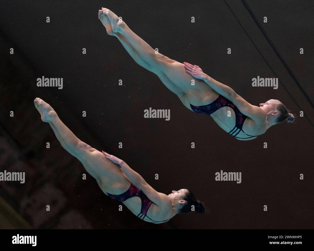 Sarah Bacon and Kassidy Cook of the United States compete during the ...