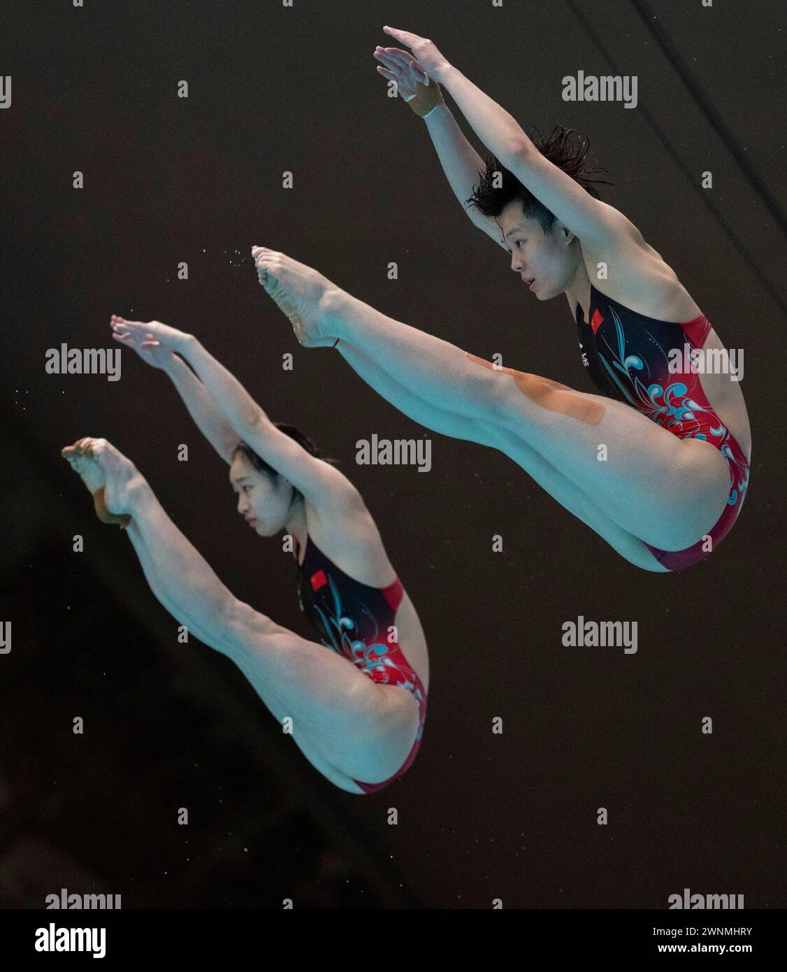 Chen Yiwen and Chang Yani of China compete during the women's 3m ...