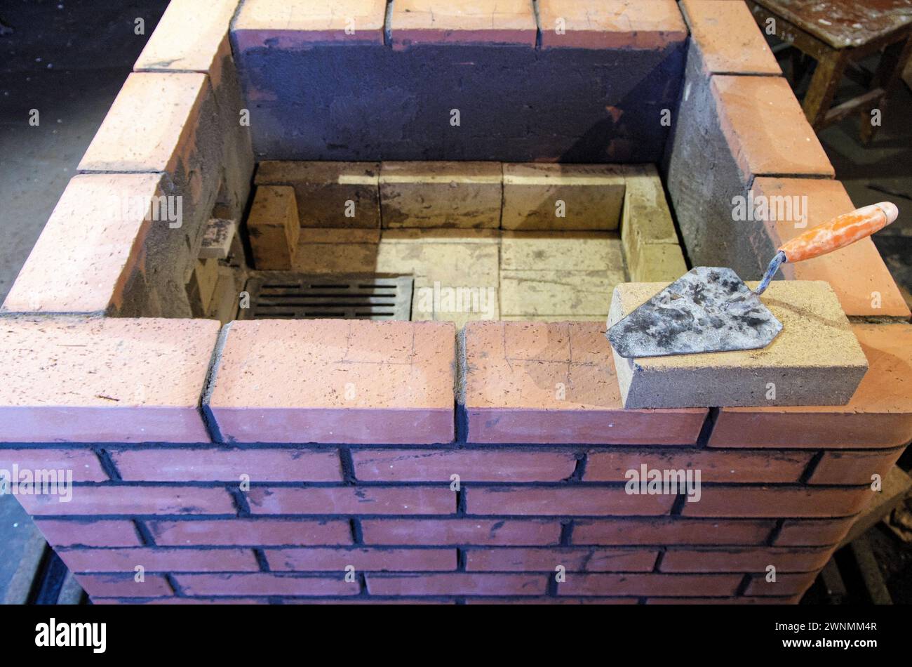 construction of brick ovens. brick stove for sauna. heating stone stove ...