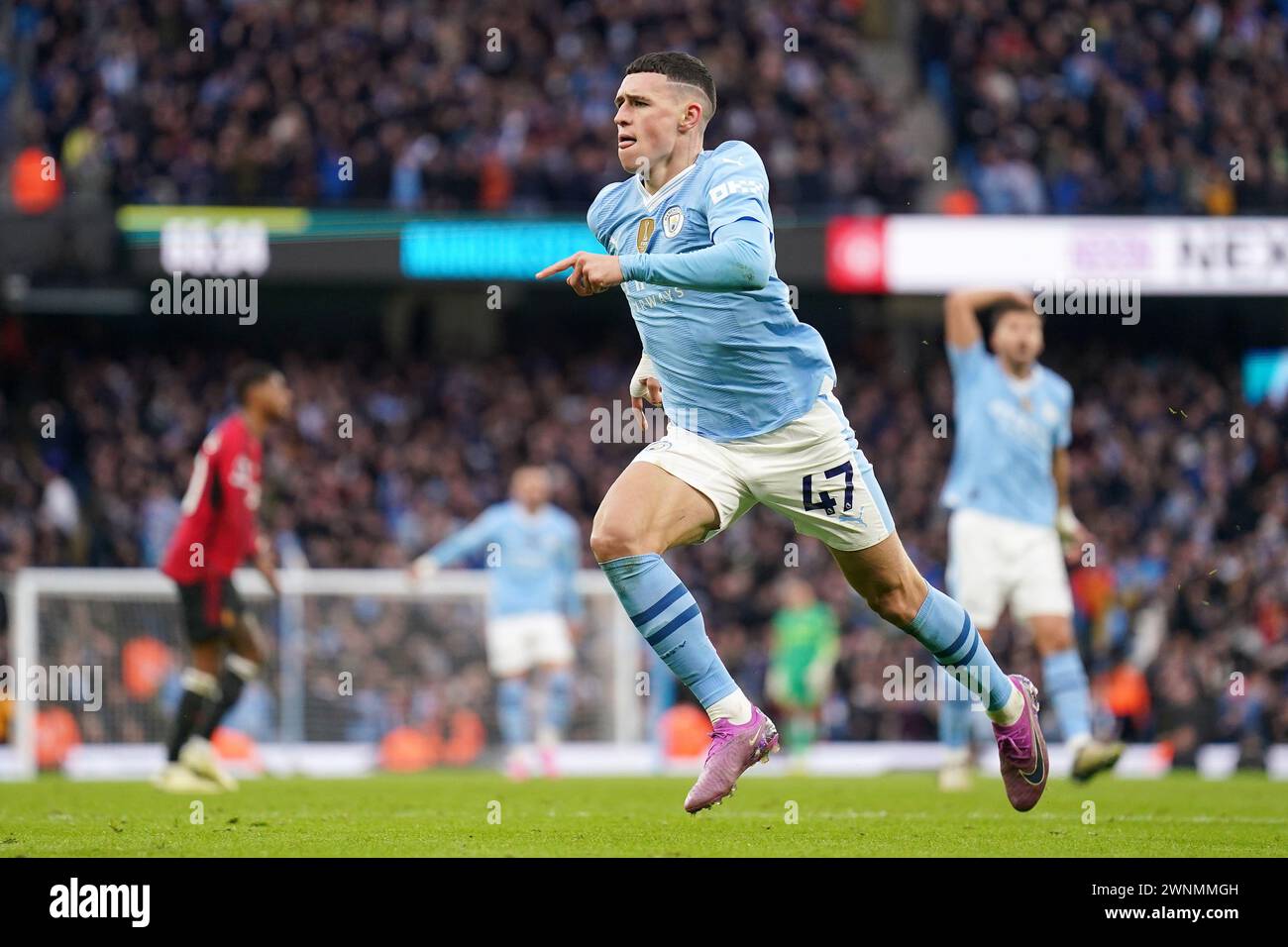 Manchester City's Phil Foden celebrates scoring their side's first goal ...
