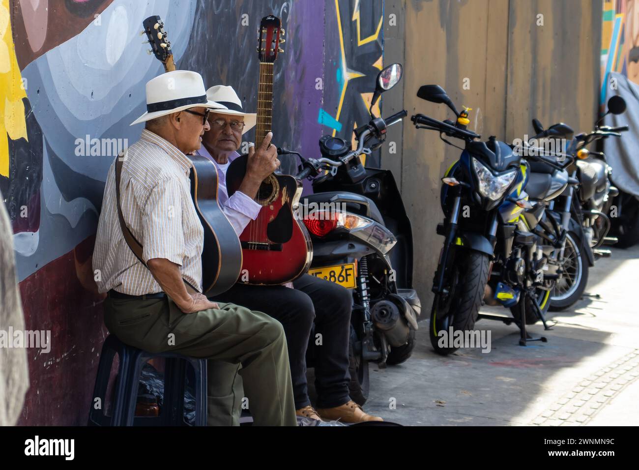MEDELLIN, COLOMBIA - JANUARY 17, 2024: Duet of senior singers with ...