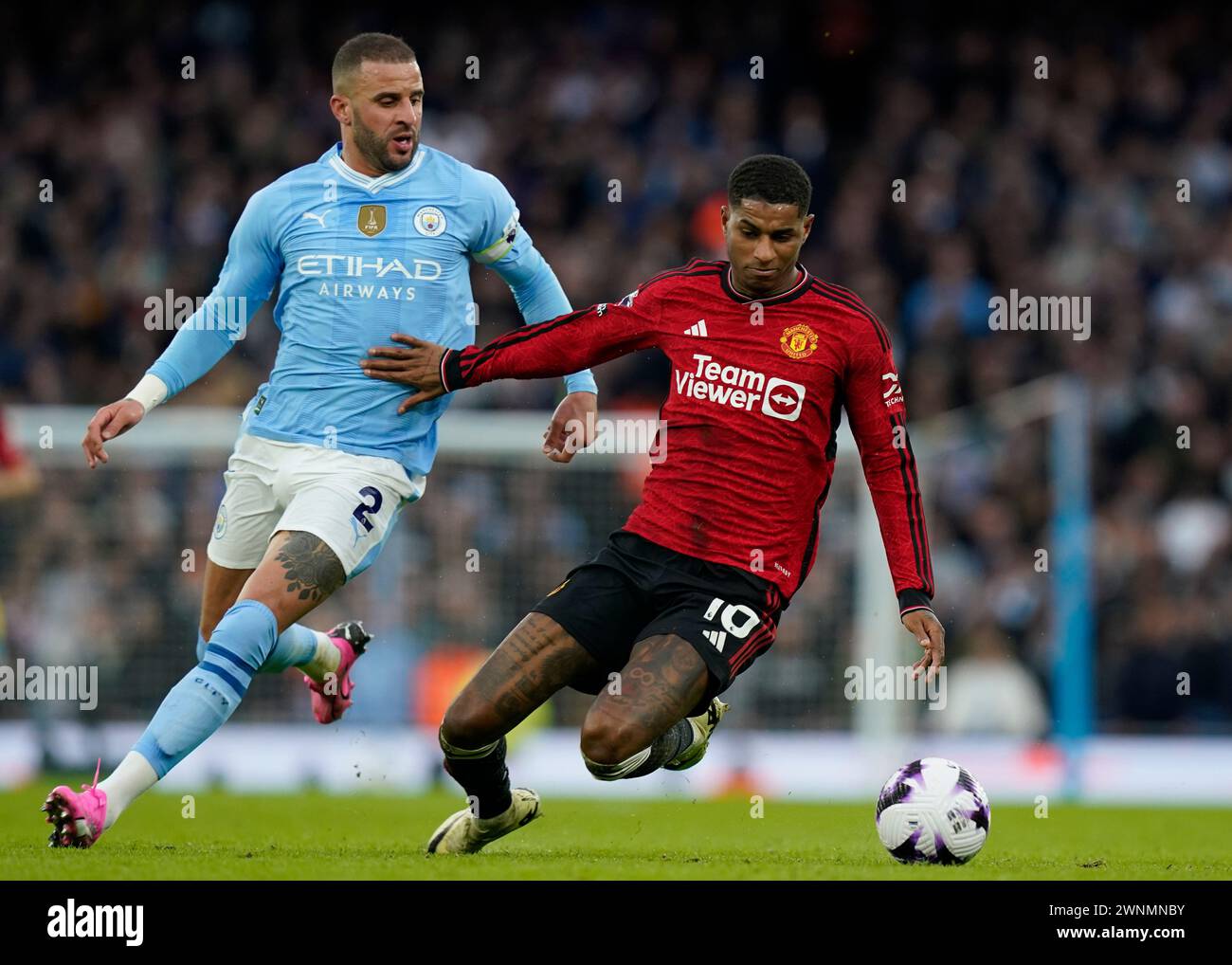 Manchester, UK. 3rd Mar, 2024. Kyle Walker of Manchester City tussles ...