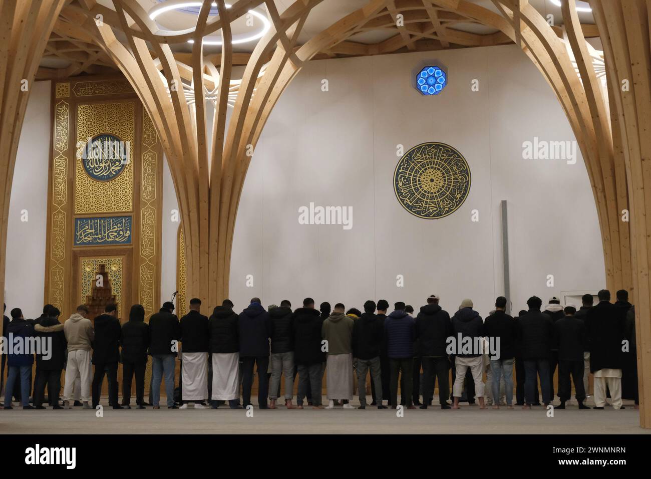 Muslims at prayer in the modern Cambridge Central Mosque, Cambridge, UK ...