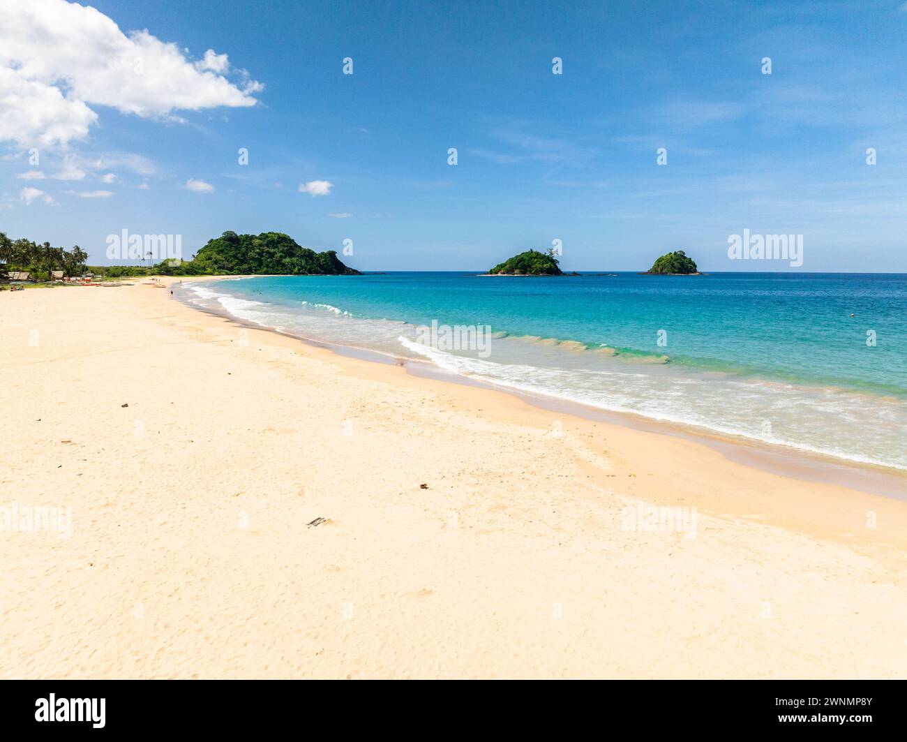 Sandy beach with inshore waves. Nacpan Beach in El Nido, Philippines ...