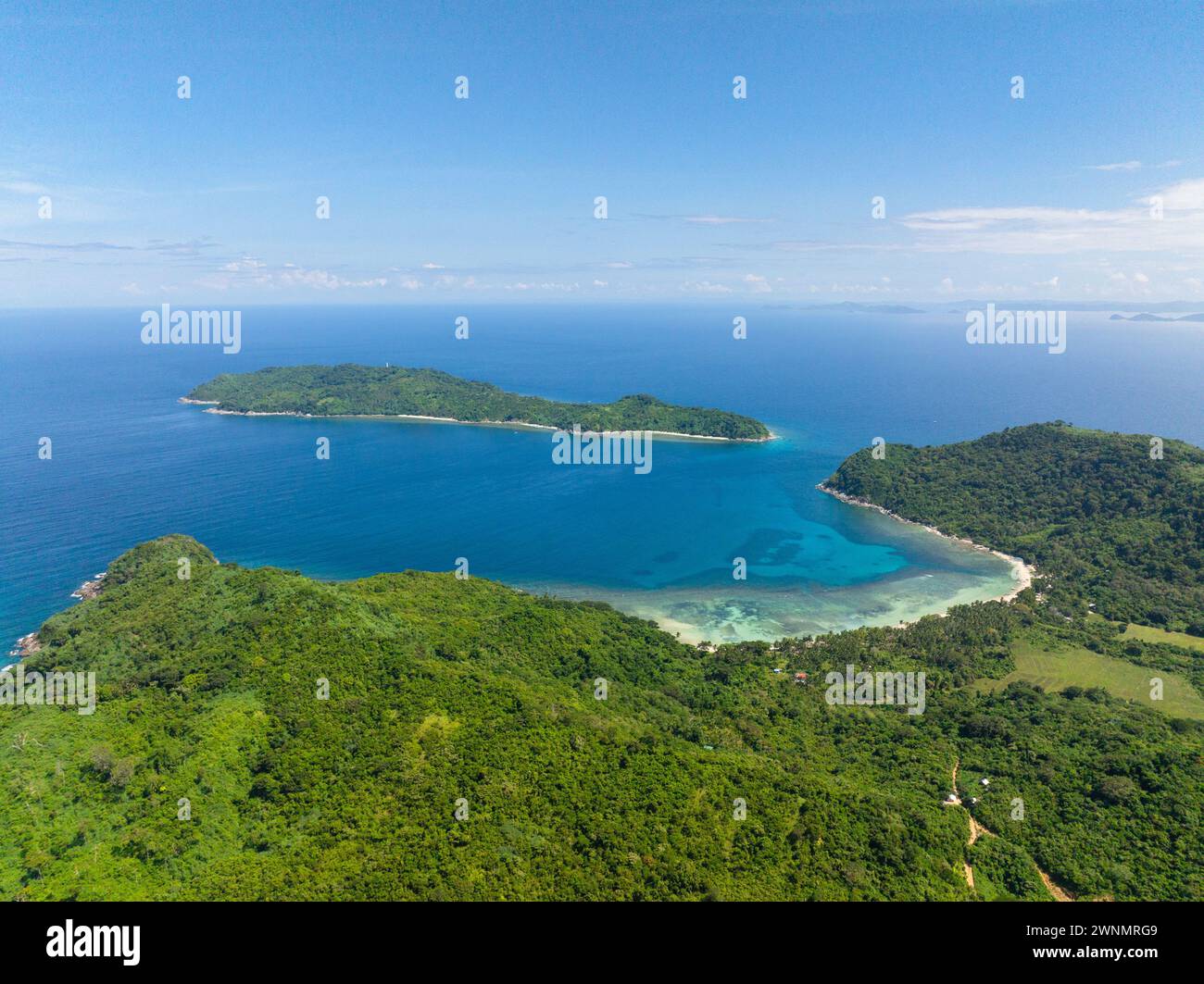 Aerial view of Cagbuli Island and coastal beach in El Nido, Philippines ...