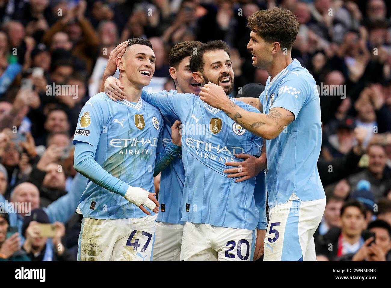 Manchester City's Phil Foden celebrates with team-mates after scoring ...