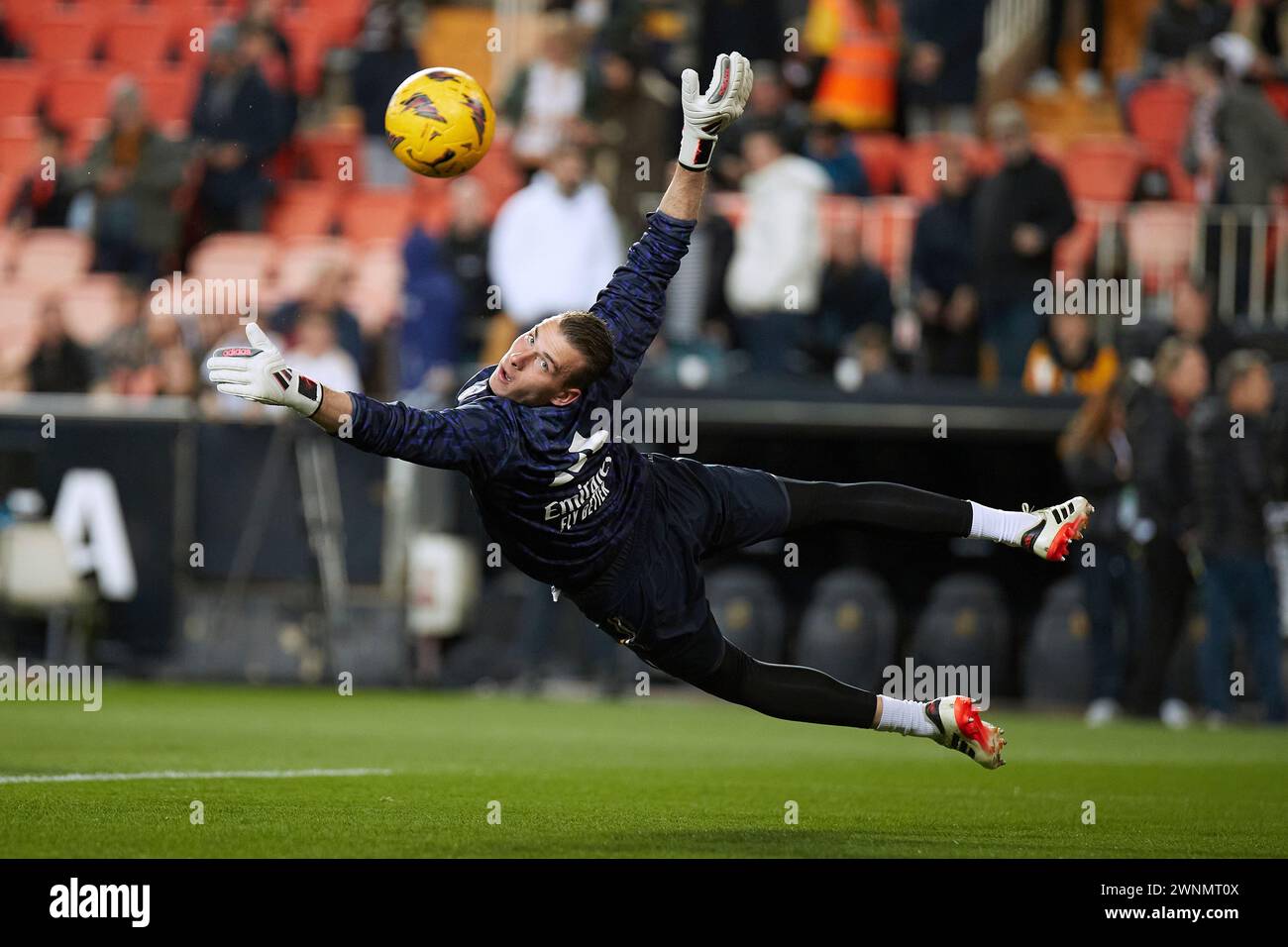 VALENCIA, SPAIN - MARCH 2: Andriy Lunin Goalkeeper of Real Madrid warms ...