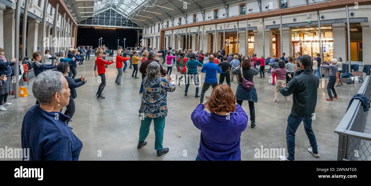 Paris, France - 03 02 2024: Le 104. View of a Qi Gong class in an old ...
